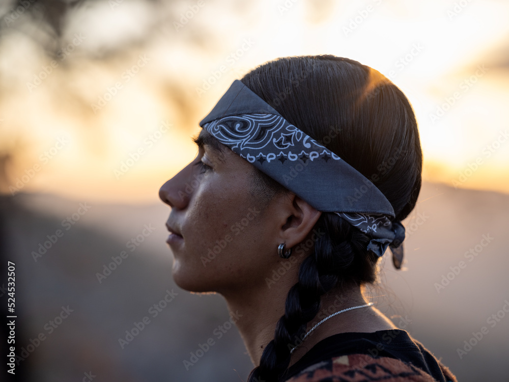 Side profile of a young native man wearing a bandana Stock Photo ...