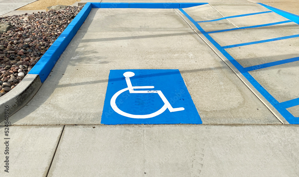 designated sign posted disable space parking lot commercial disabled ...