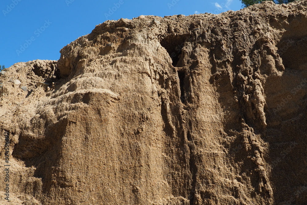 Sandstone is a fragmentary sedimentary rock, a homogeneous or layered ...