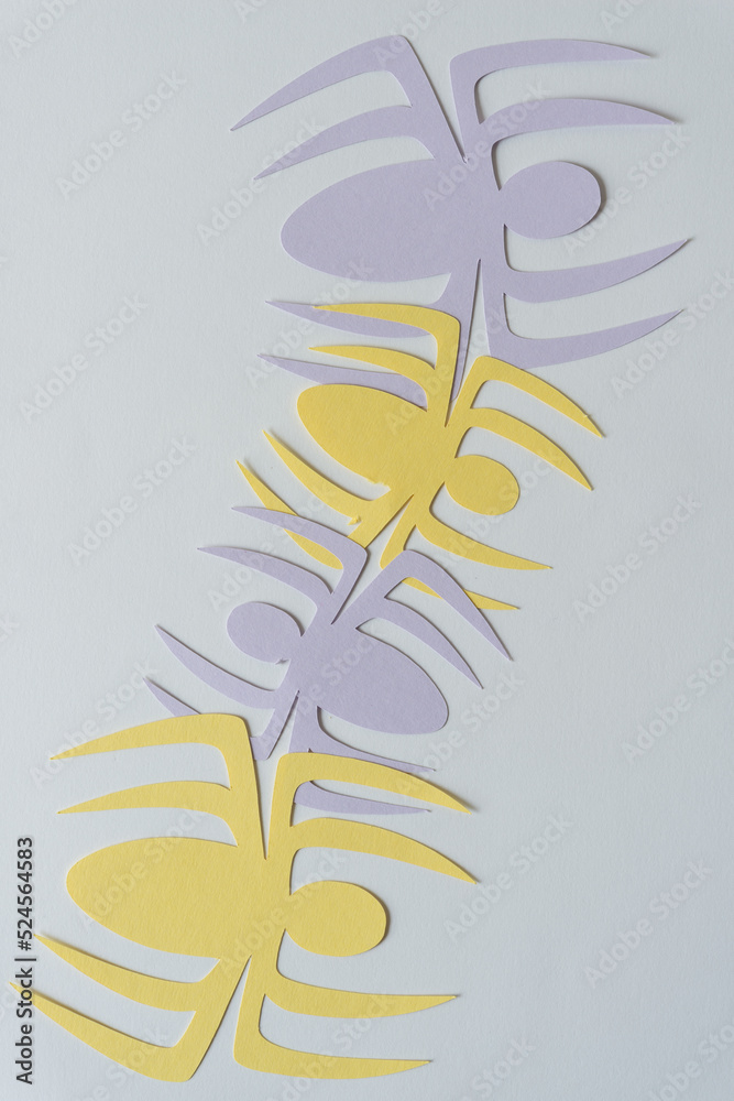 string of paper spiders on blank paper Stock Photo | Adobe Stock