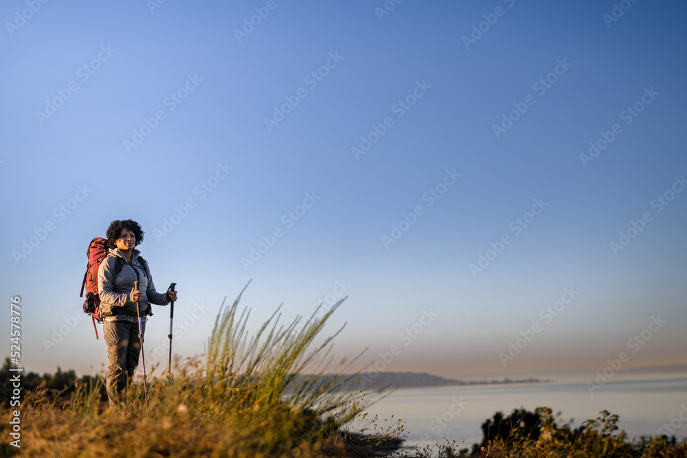 U.S. Army female soldier putting in the miles with an early morning ...