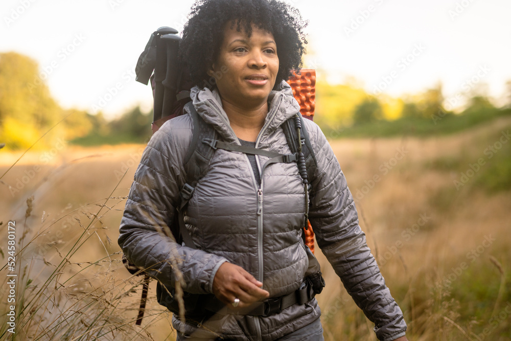 U.S. Army female soldier putting in the miles with an early morning ...