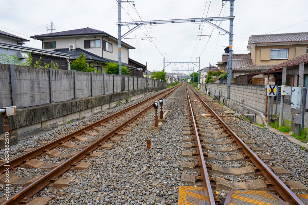 Local train roadway and grade crossing in Uji, Kyoto, Japan Stock Photo ...