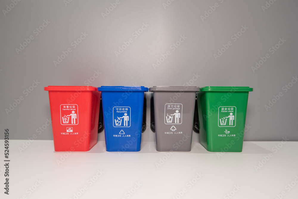 Foto de Four trash cans with symbols of waste sorting, sustainable ...
