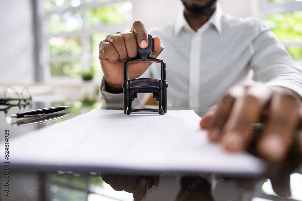 African American Black Man Using Notary Stamp Stock Photo | Adobe Stock
