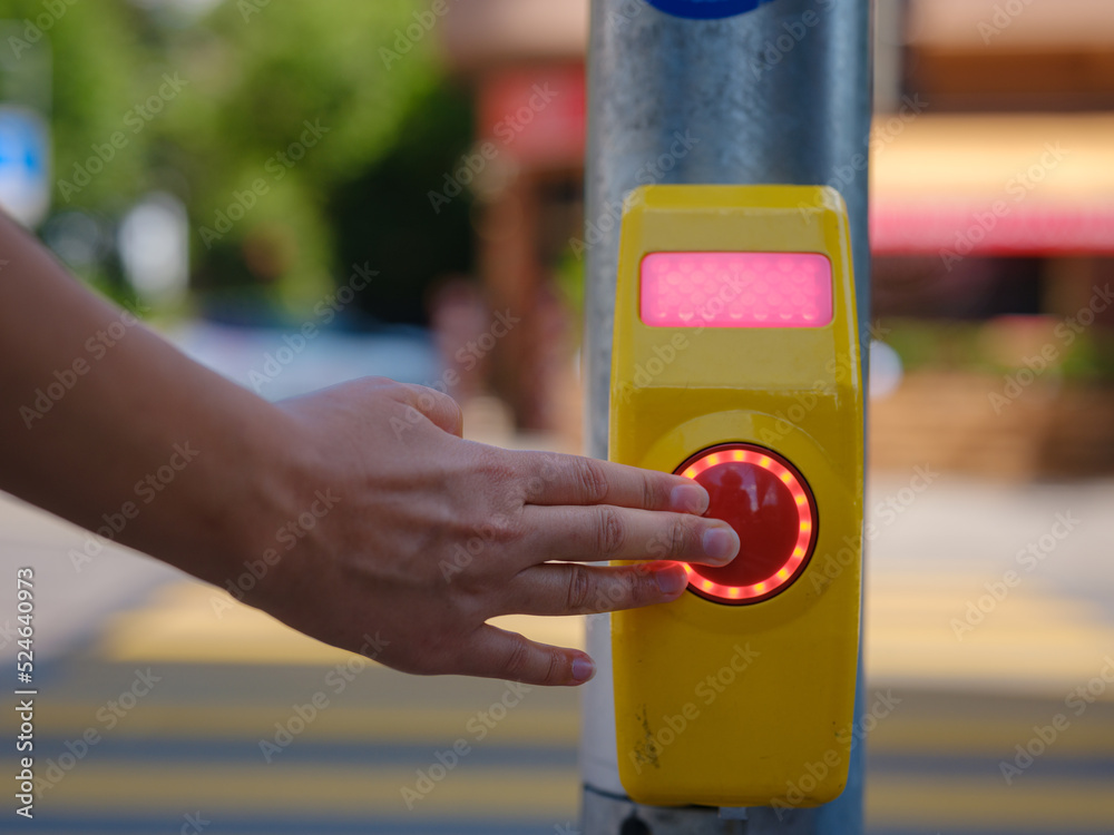 Close-up of a crosswalk signal button taken at a pedestrian controlled ...