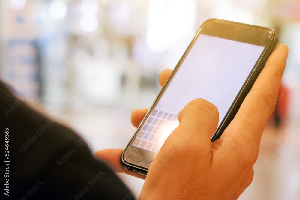 Closeup Image of man checking his phone Stock Photo | Adobe Stock