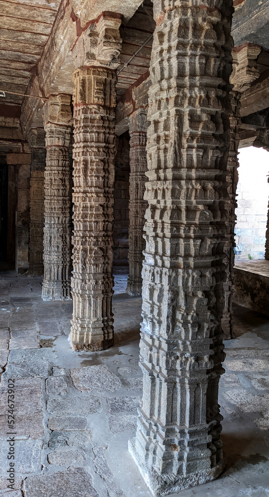 Intricate stone worked pillars of an ancient Kumbakonam temple, Tamil ...