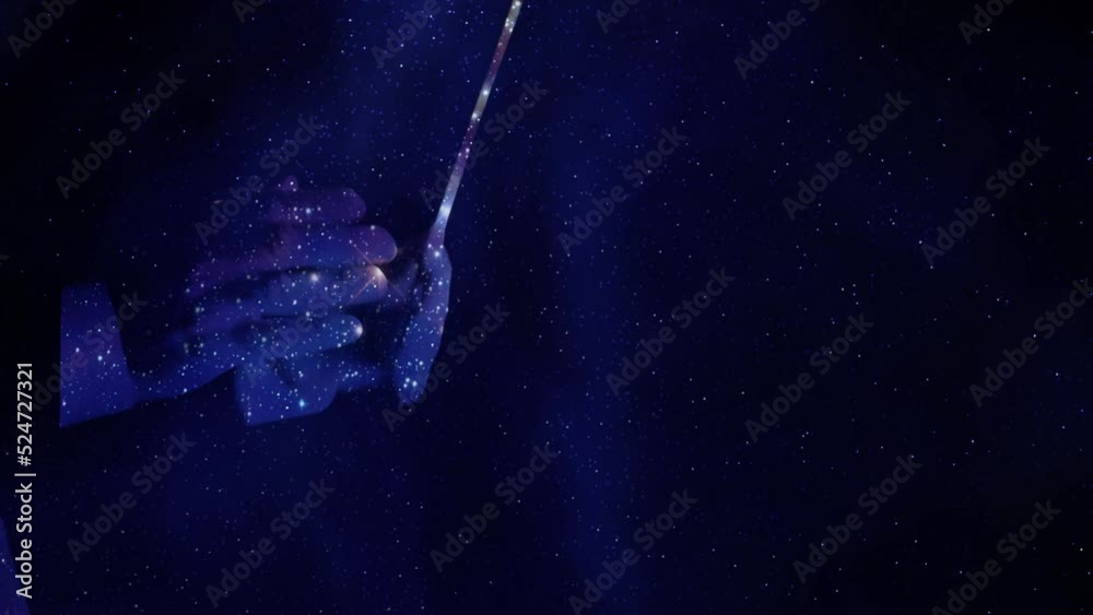 Symbolic double exposure: the hands of an orchestra conductor ...