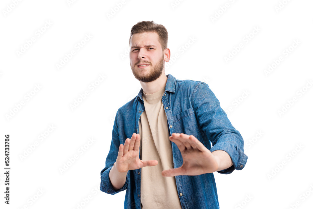 Serious dissatisfied man with denial facial expression making stop ...