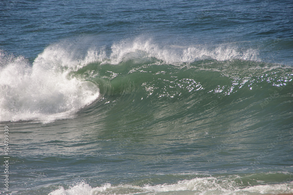 wave known as shorebreak at post six on Copacabana Beach in Rio de ...