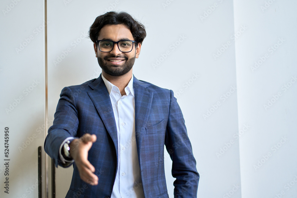 Smiling young indian business man leader, arabic executive manager ...