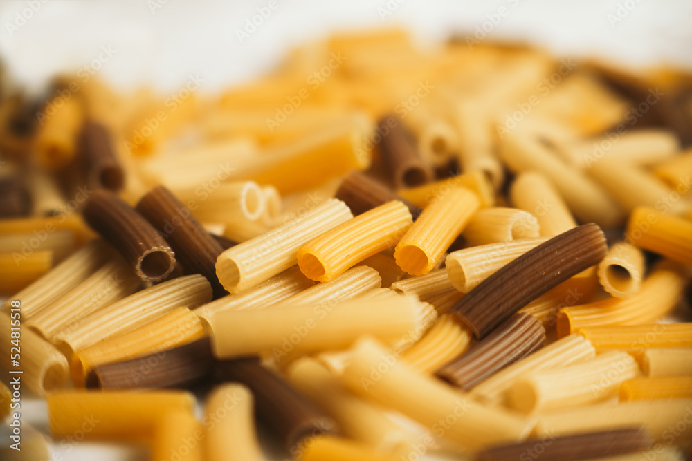 Assortment of colorful macaroni Stock Photo | Adobe Stock