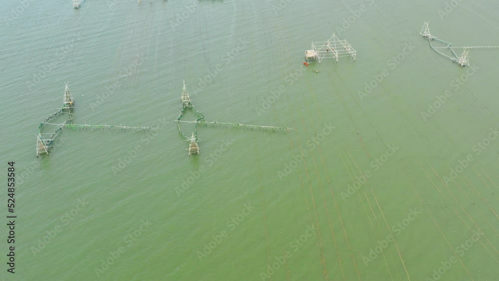 Traditional fish farm in the Philippines with wooden cages, view from ...