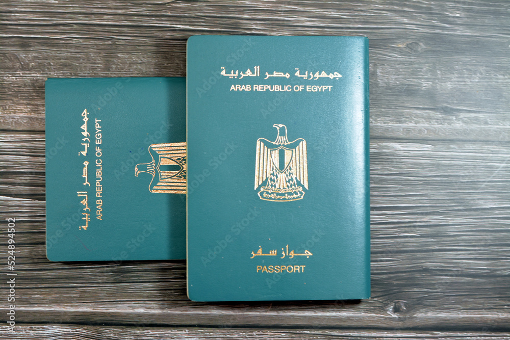 Egyptian passport isolated on wooden background, Arab republic of Egypt ...