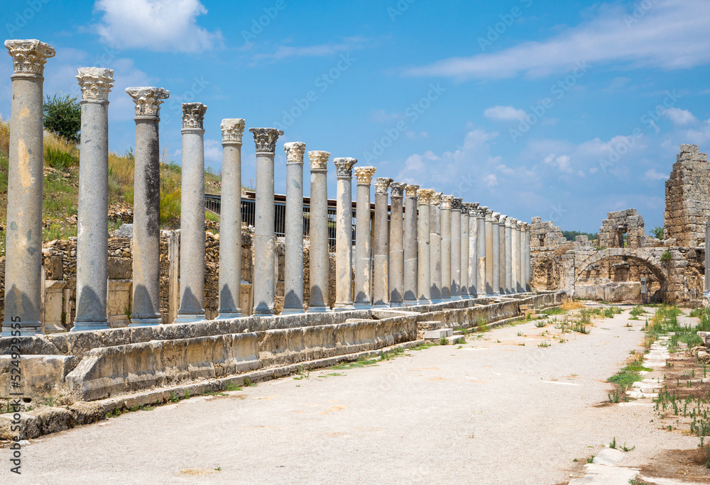 Roman ruins. Colonnaded street of city Perge. Ancient Greek colony from ...