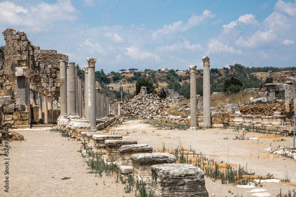 Roman ruins. Colonnaded street of city Perge. Ancient Greek colony from ...