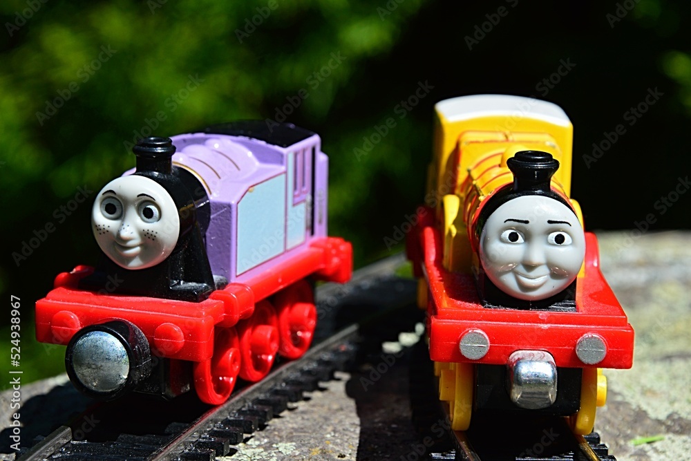 Toy cast iron train models of Molly (yellow) and Rosie (pink) from ...