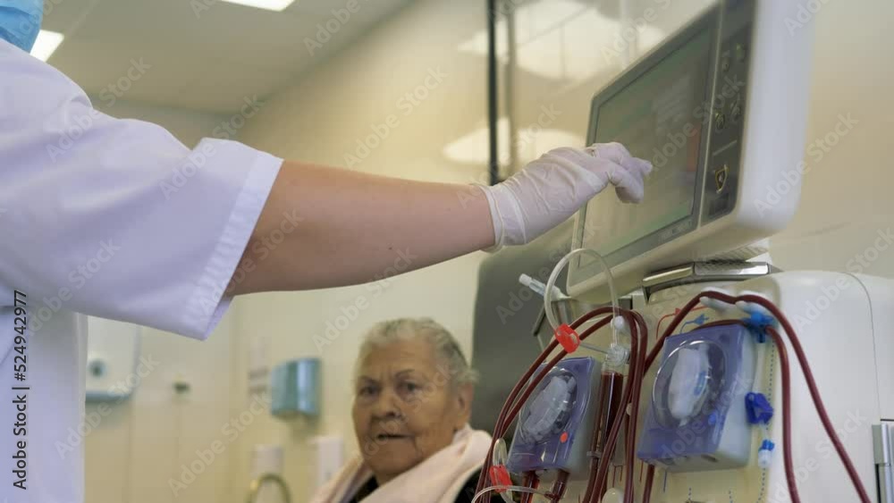 Setting up the device for the procedure. Equipment start-up. Blood ...