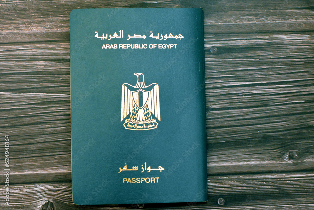 Egyptian passport isolated on wooden background, Arab republic of Egypt ...