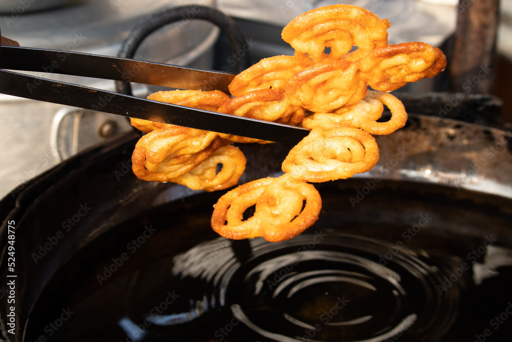 Holding Deep Fried Indian Jalebi Also Known As Jilapi, Jilebi, Jilipi ...