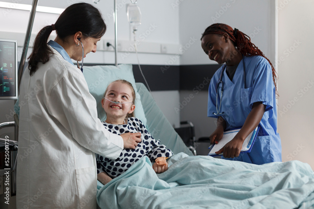 Happy physician expert and nurse consulting ill little girl health ...