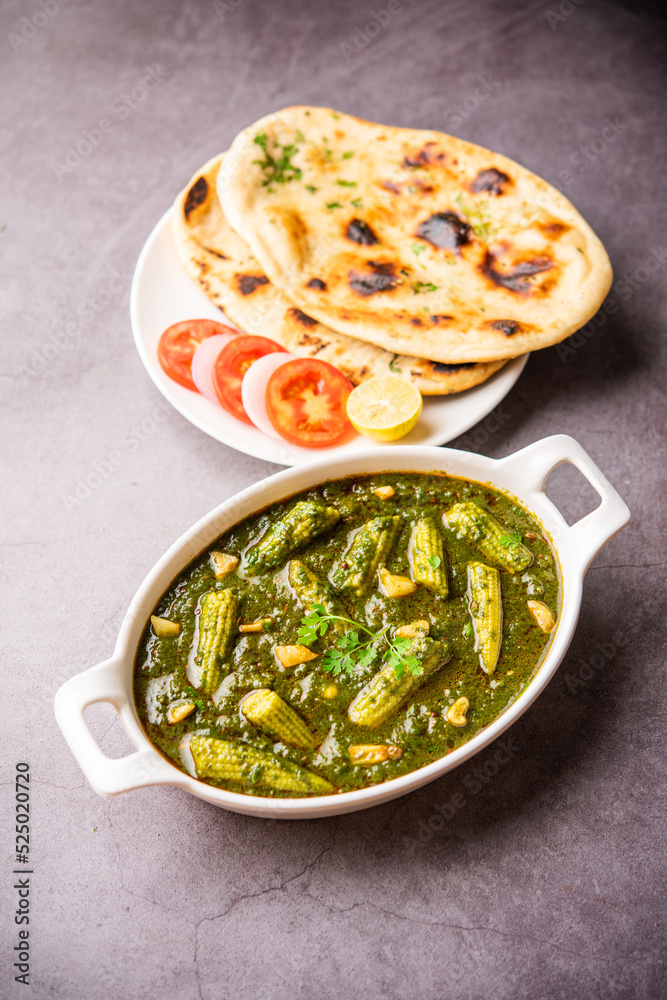 palak baby corn sabzi also known as spinach makai curry served with ...