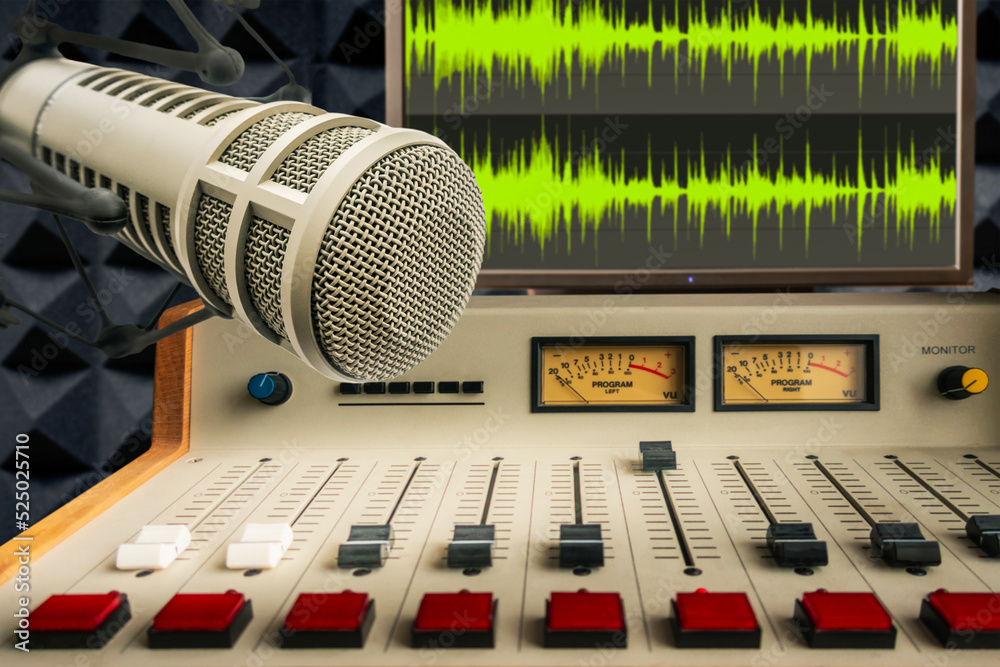 professional microphone, sound mixer and sound wave form on computer ...