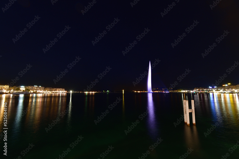 Switzerland, Geneva. Night view of the Jet d'Eau (Water-Jet) on Lake ...