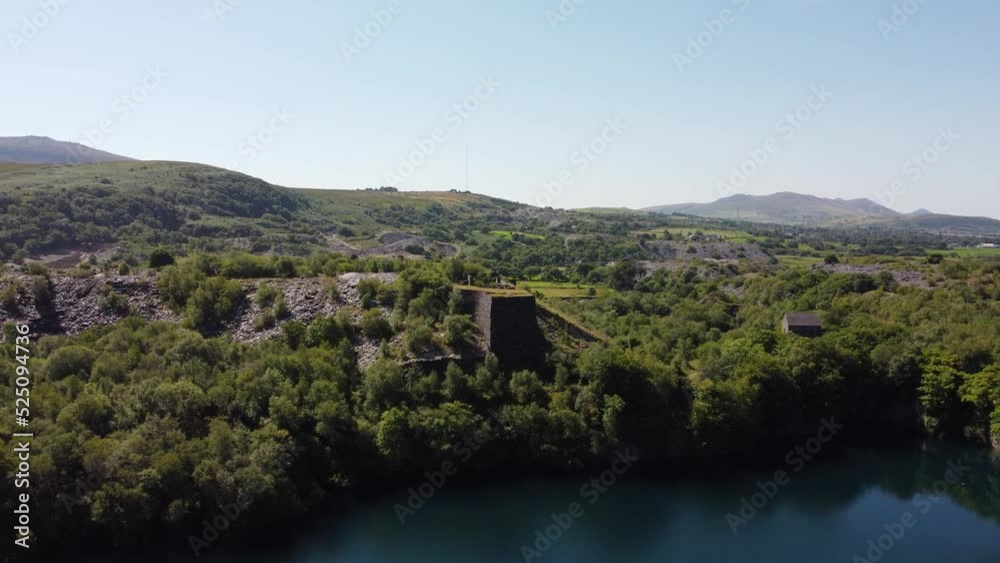 Dorothea disused overgrown slate mining quarry in lush dense Snowdonia ...
