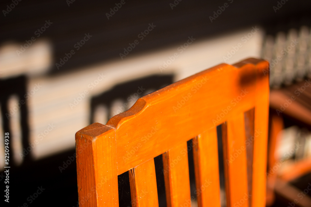 Chair with sunlight and chair shadow. Use a wide f-number to make it ...
