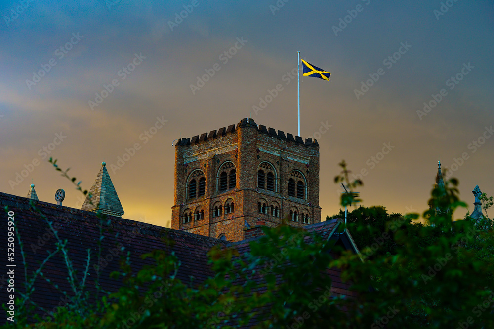 flags of saint alban on cathedral tower Stock Photo | Adobe Stock