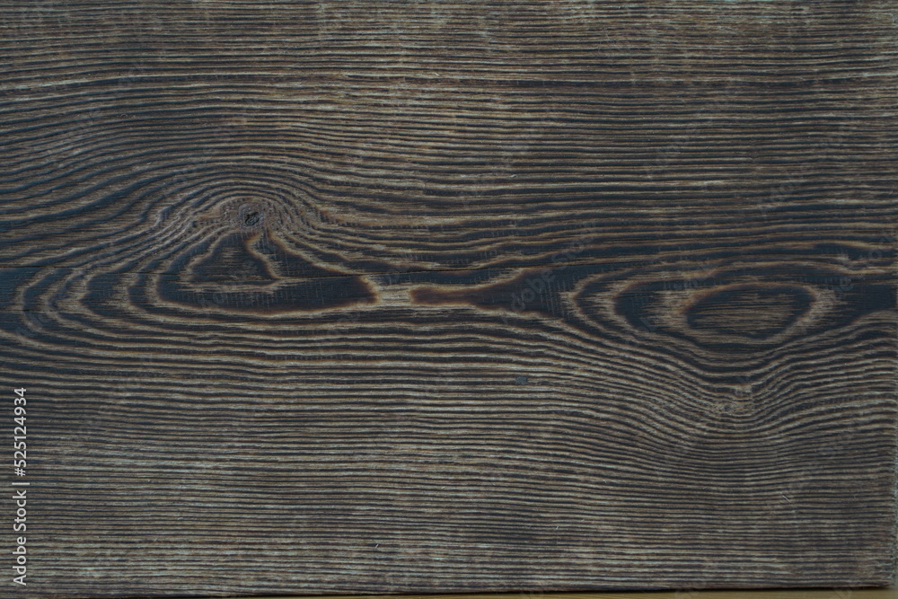 Aged, burned rustic braun dark pine wood texture. Boards with a knot ...