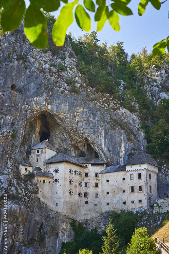 Vertical picture of the Postojna castle also known as a Predjamski Grad ...