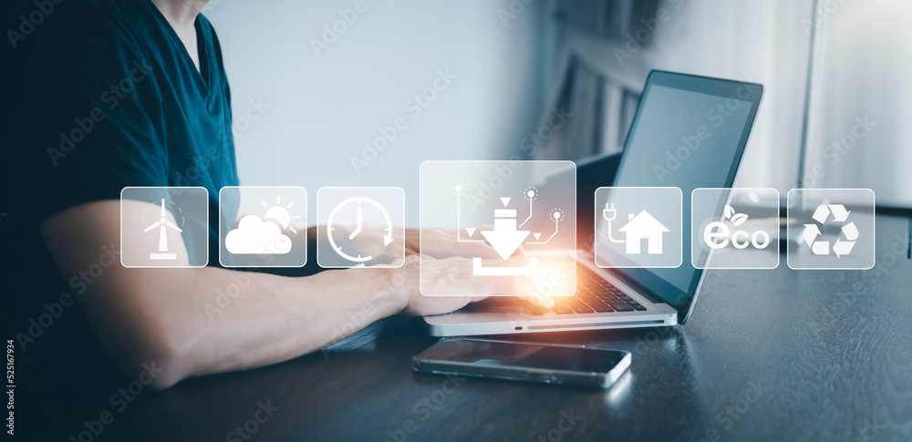 Laptop and eco with energy worker interface, sustainable development ...