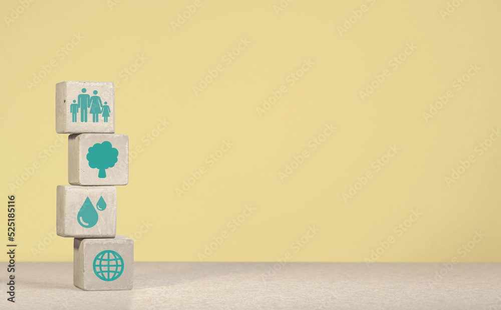 The concept of environmental protection. concrete cube with green ...