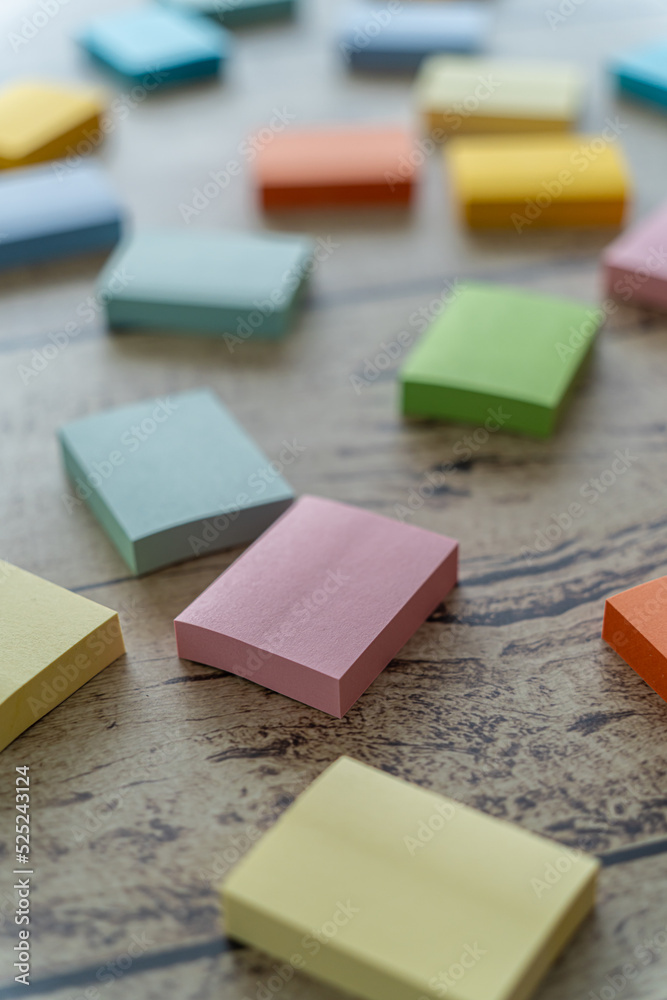 pile of sticky notes on office table at work Stock Photo | Adobe Stock