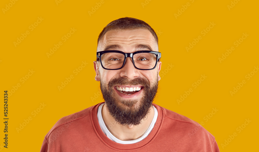 Studio portrait of happy man in glasses. Closeup headshot of cheerful ...