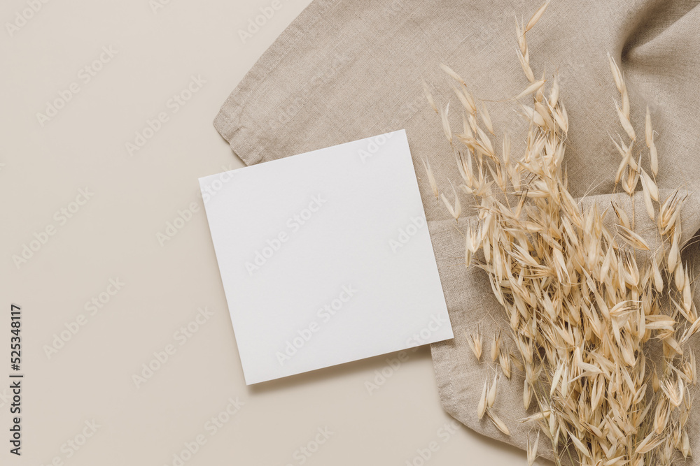 Blank paper mockup card with linen cloth and dry oats, top view, flat ...