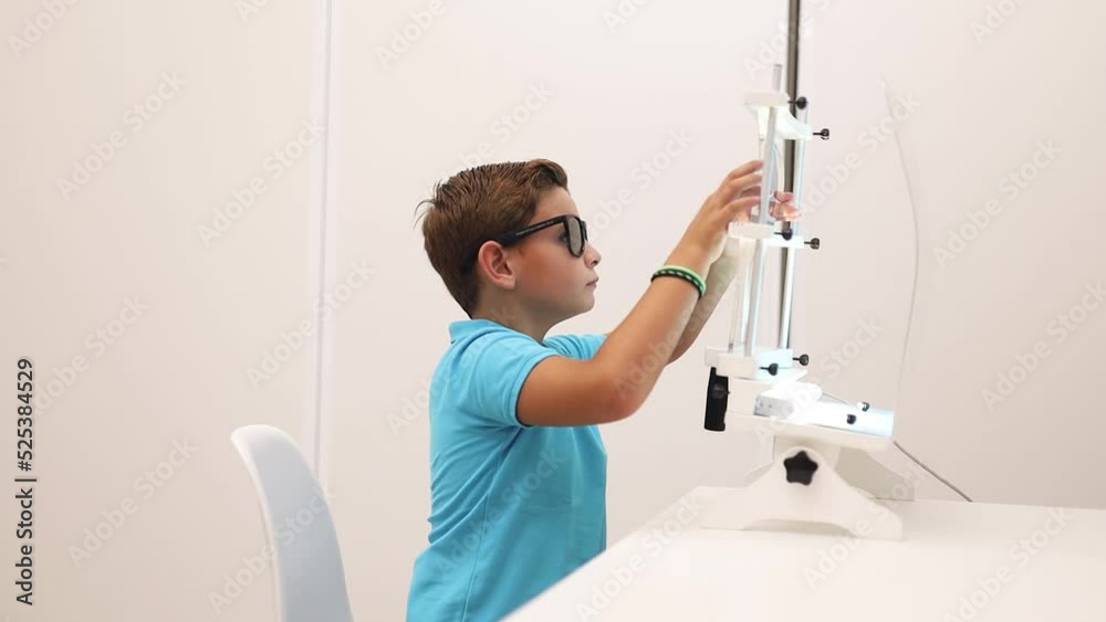 A child undergoes a convergence-divergence test using vectograms with ...