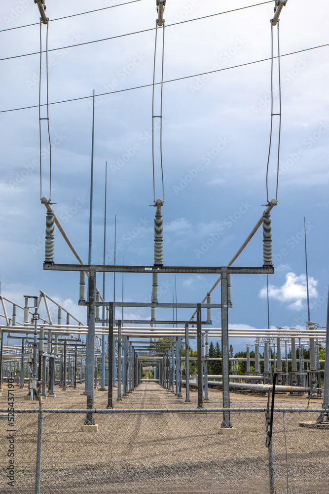 View inside of an electrical utility transformer station showing high ...