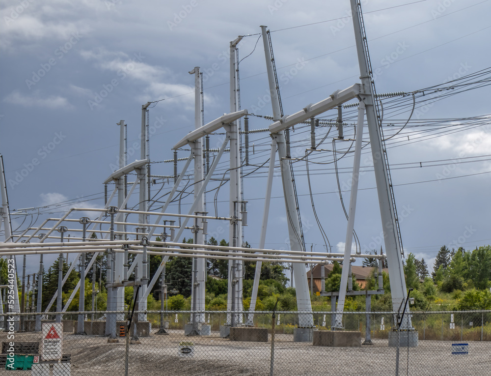 View inside of an electrical utility transformer station showing high ...