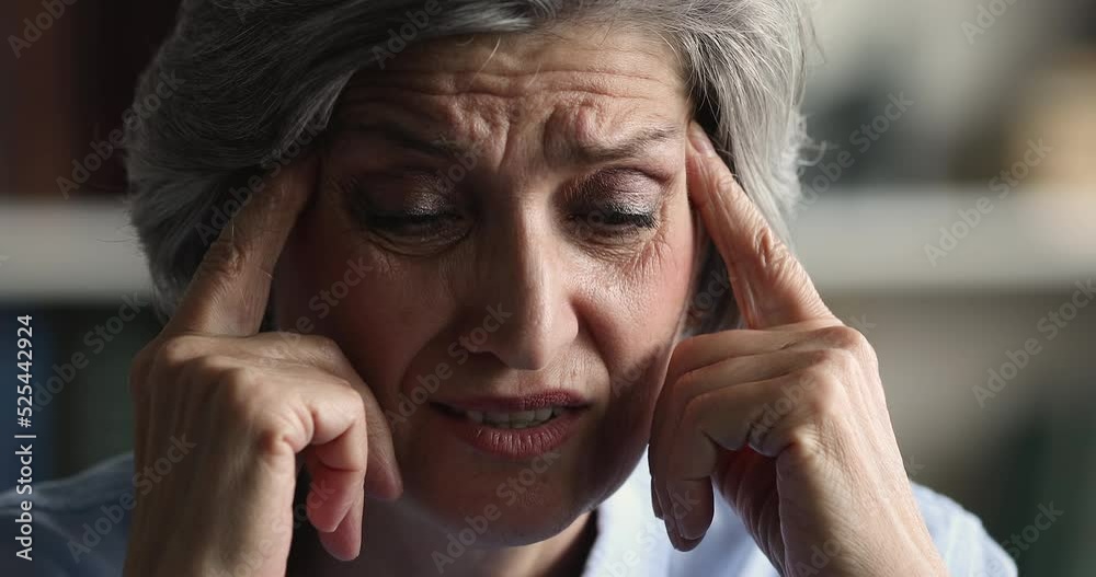 Confused uncertain senior lady speaking at camera, explaining mistakes ...