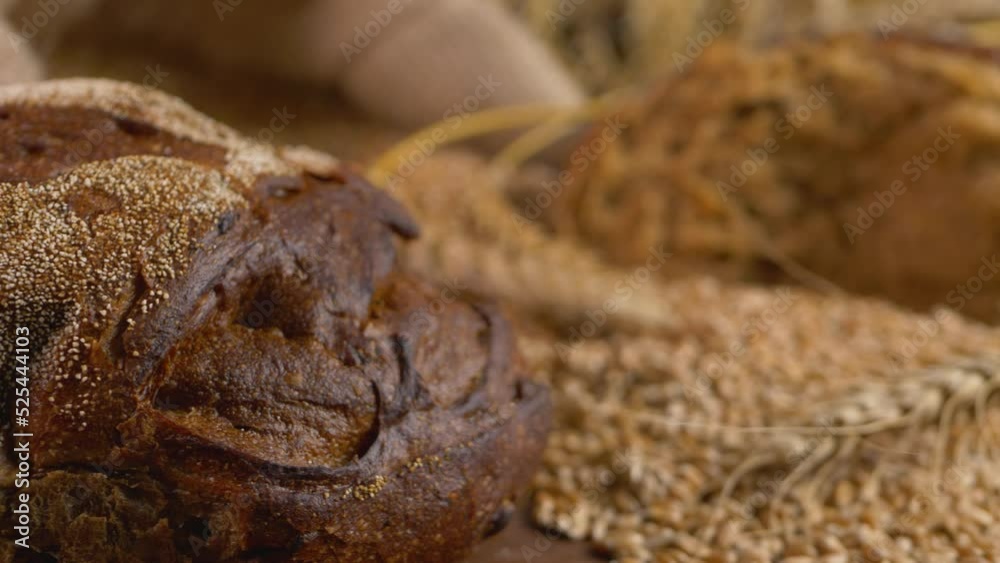 Bread made with rye grain, mill or grain elevator concept. Agrarian ...