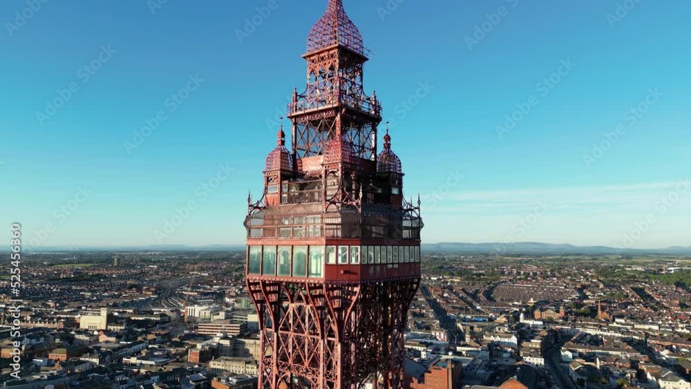 Aerial drone flight around the top of Blackpool Tower showing the ...