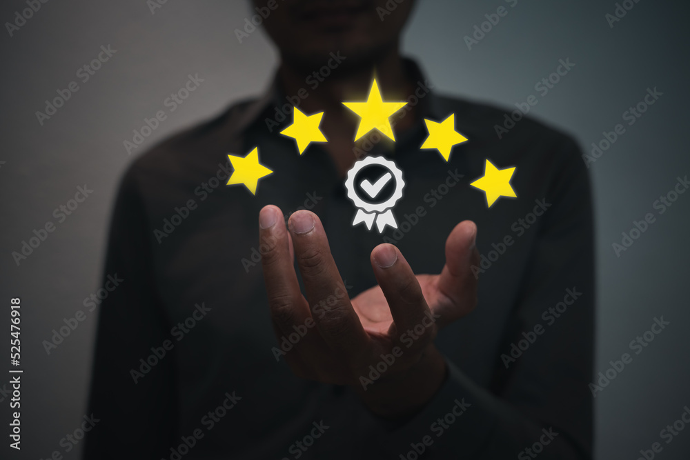 Hand holding the sign of the top service Quality assurance, Guarantee ...