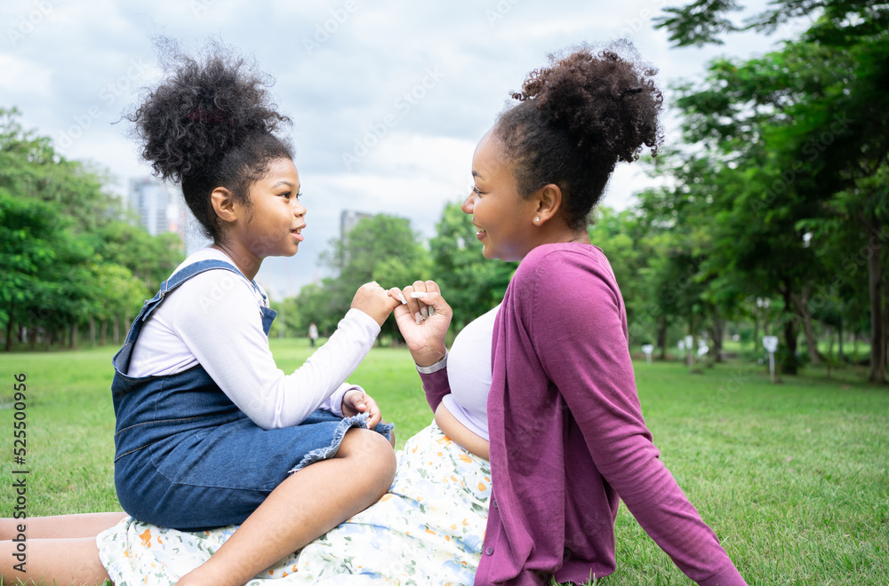 Fotka „Friendship of generations. Mother and daughter hand making ...