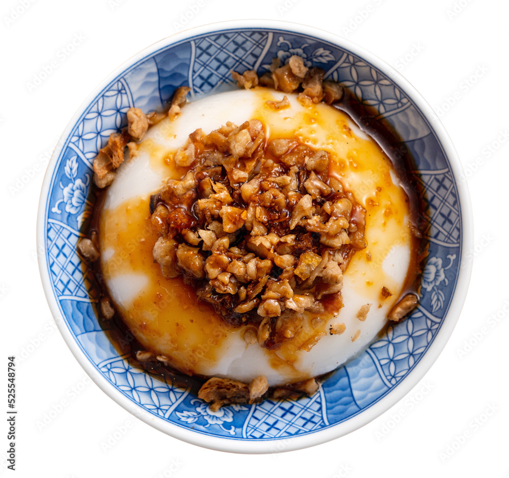 Taiwanese savory rice pudding Wa gui with chopped dried radish and soy ...
