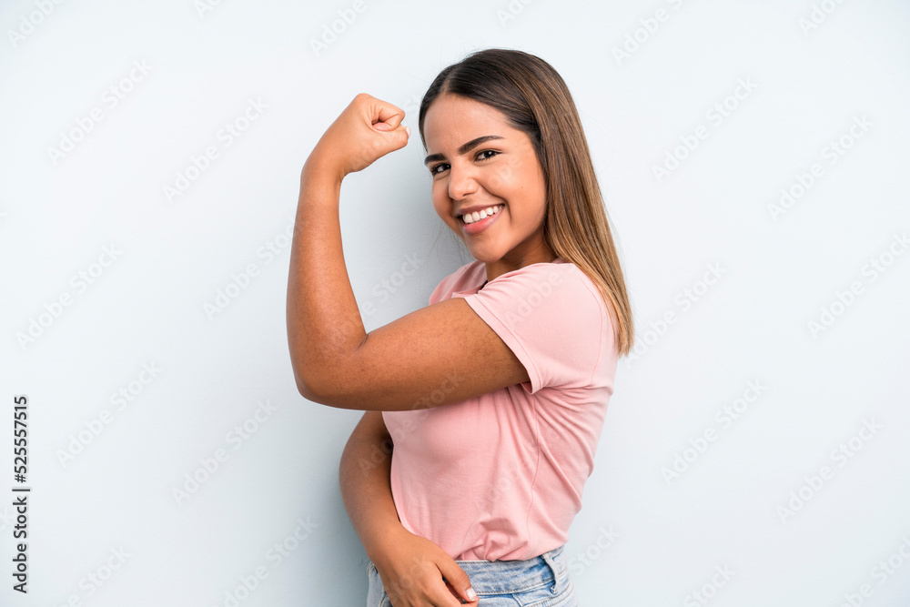 hispanic latin pretty woman feeling happy, satisfied and powerful ...