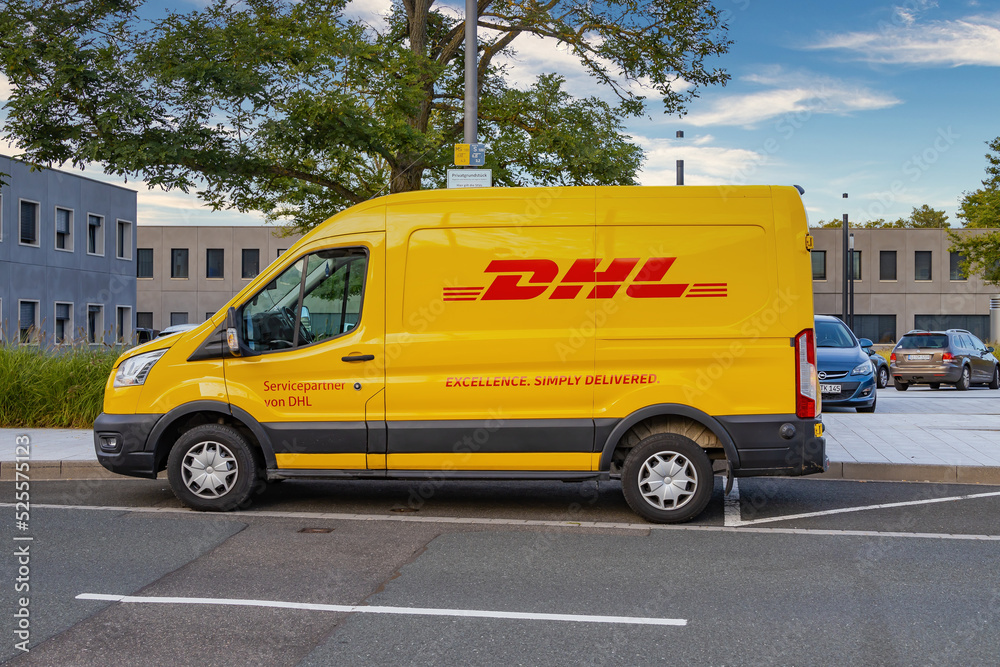 DHL LOGO delivery truck Stock Photo | Adobe Stock